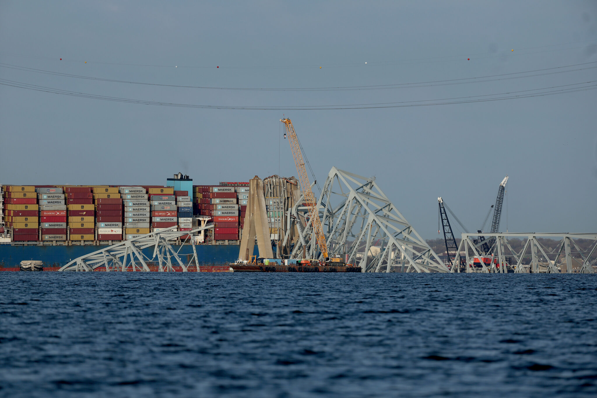 Massive crane put in place to clear Baltimore bridge debris - HUM News ...